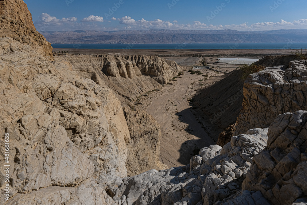 View of Wadi Qumran and the Dead Sea in the background as seen from the ...