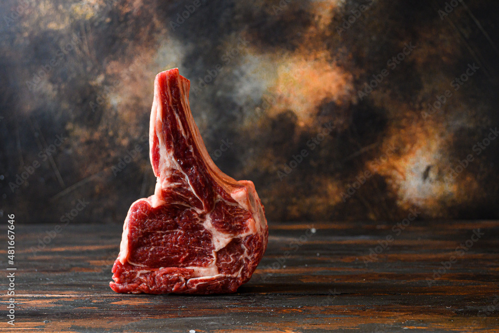 Raw Dallas black angus or spencer marbled steak in butchery side view ...