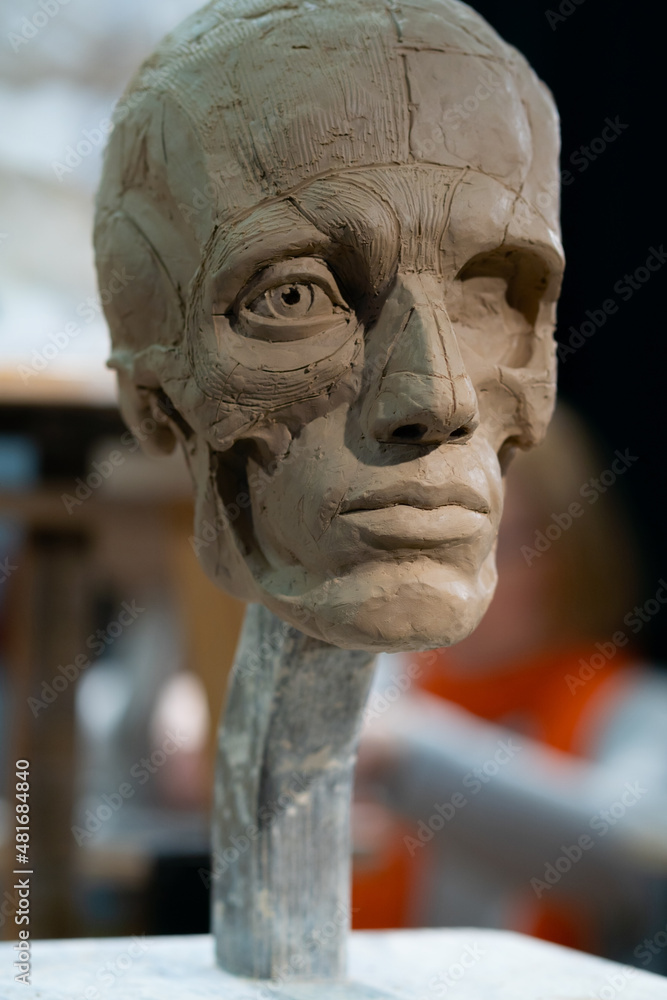 The process of creating ecorche. The sculptor is working. Sculpture of ...