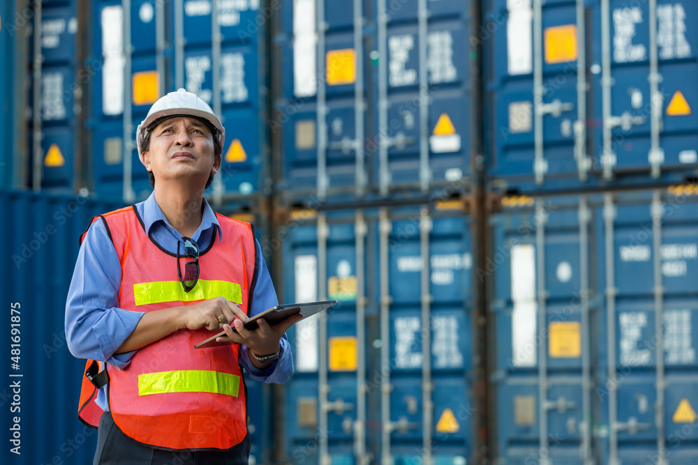 Professional foreman work at Container cargo site check up goods in ...