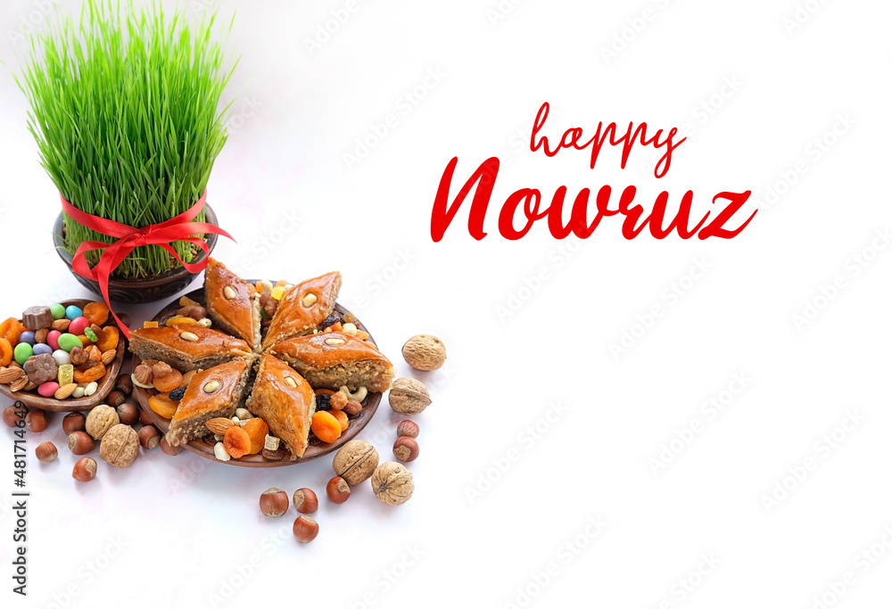 Happy Novruz. festive table. green wheat grass with red ribbon, arabic ...