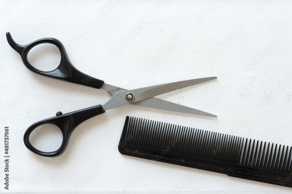 scissors and comb Stock Photo | Adobe Stock