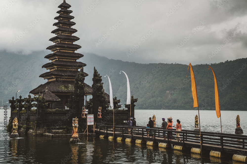 People visiting Segara Ulun Danu Batur Temple, Bali, Indonesia to pray ...