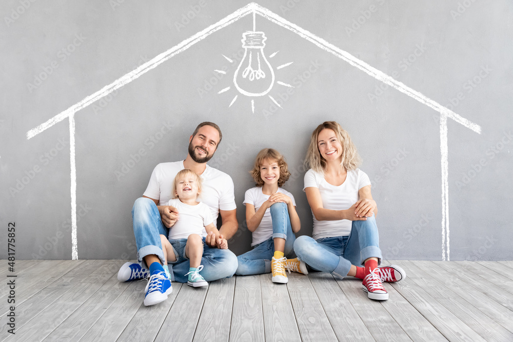 Happy family with two kids playing into new home Stock Photo | Adobe Stock