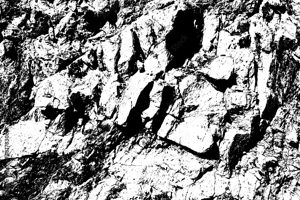 Grungy cragged bumpy pitted cavity stone facade, split layer gap.Ruined ...