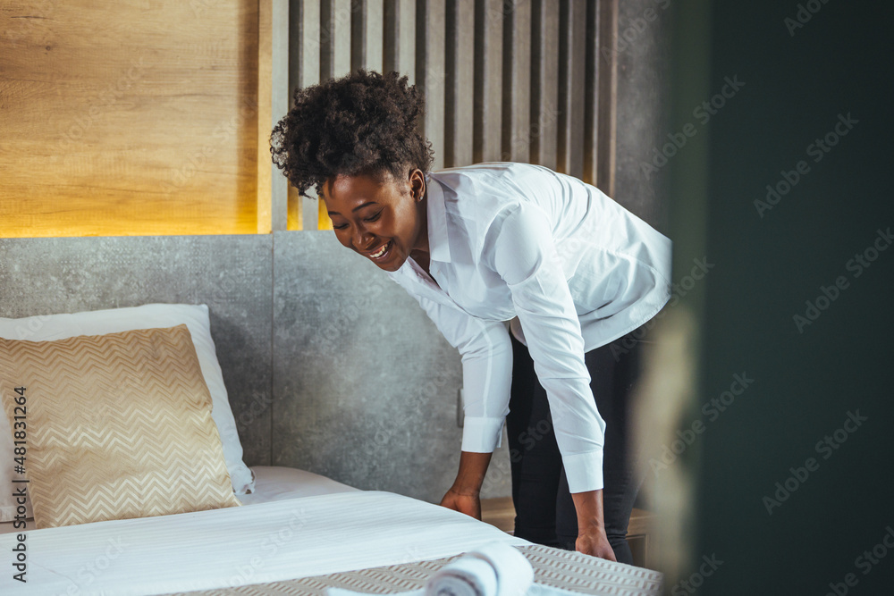 African maid making bed in hotel room. Staff Maid Making Bed. African ...