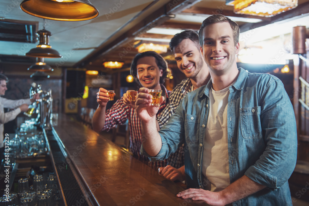 Men in pub Stock Photo | Adobe Stock