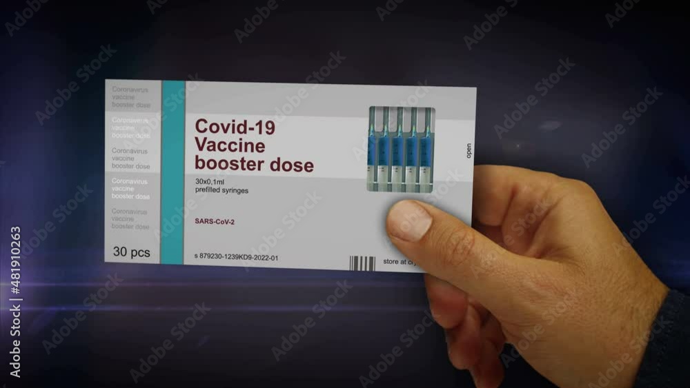 Covid-19 vaccine booster dose pack in hand. Coronavirus sars-cov-2 ...