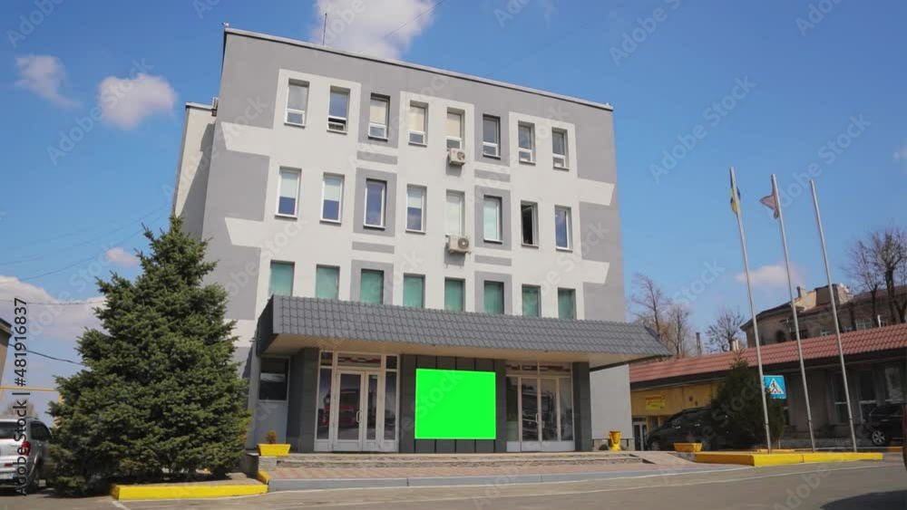 Office building with green screen. advertising banner green screen. An ...