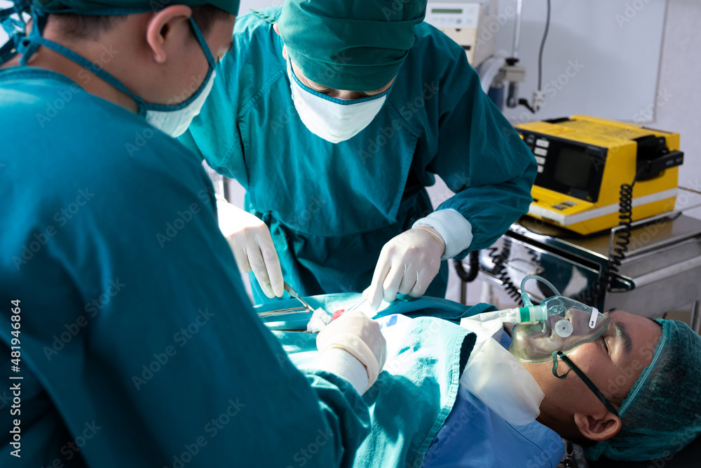 Selective focus at defibrillator while doctor use it to pump at chest ...