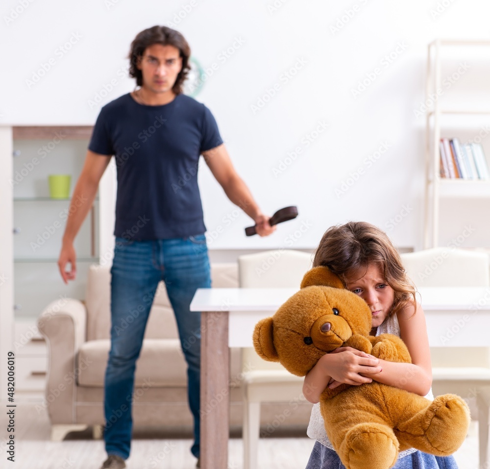 Angry father punishing his daughter Stock Photo | Adobe Stock