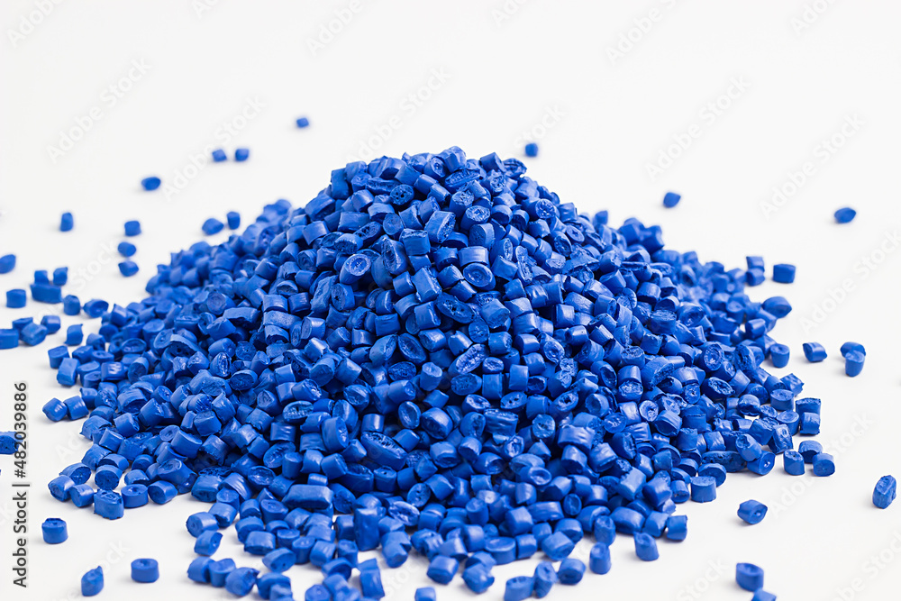 blue granules of polypropylene, polyamide. White background. Plastic ...