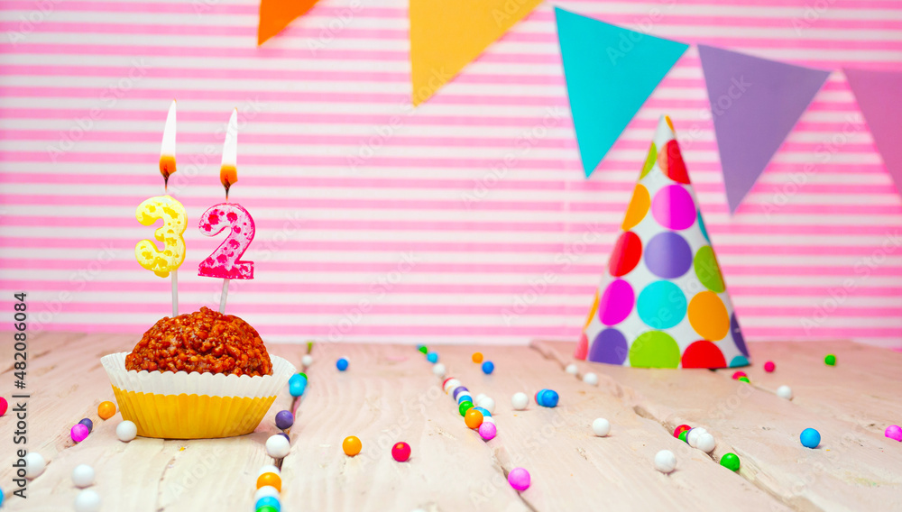Happy birthday for 32 years old. Festive background with muffin. Copy ...