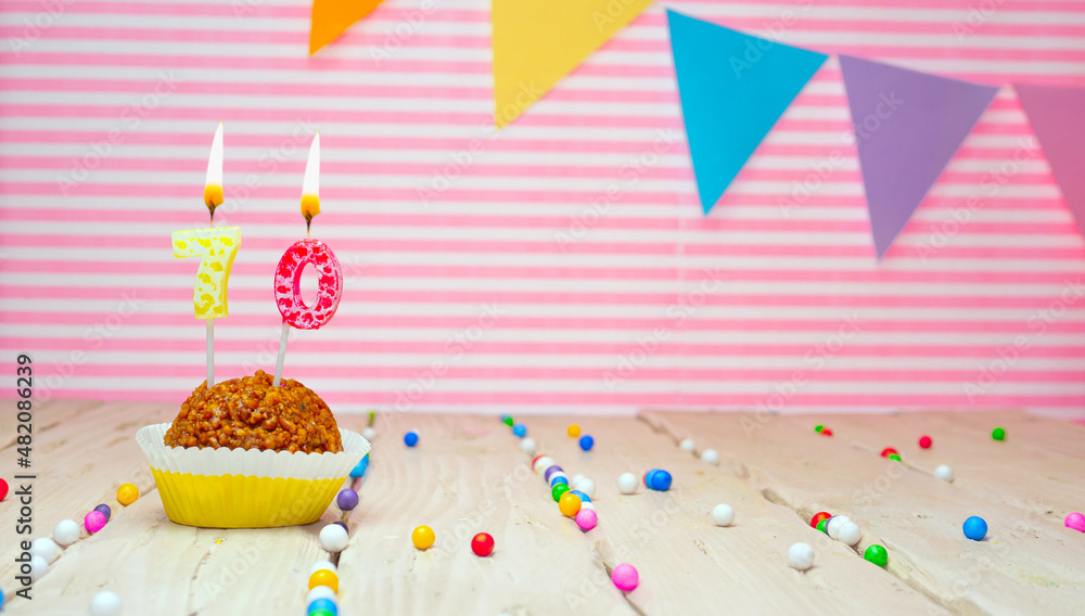 Happy birthday to 70 years old. Festive background with muffin. Copy ...