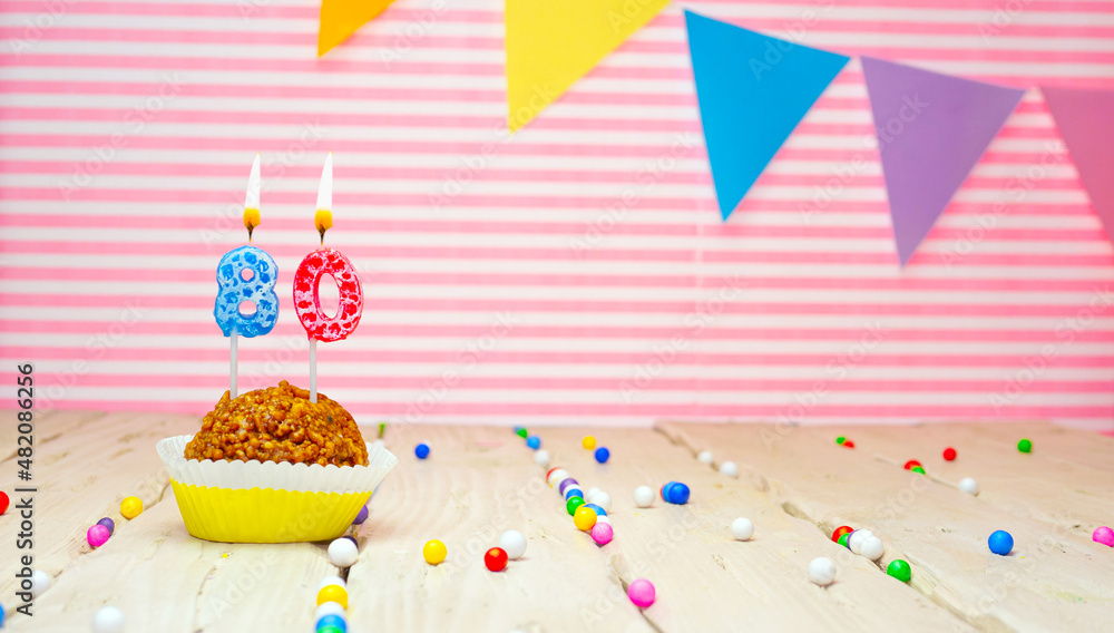 Happy birthday to 80 years old. Festive background with muffin. Copy ...