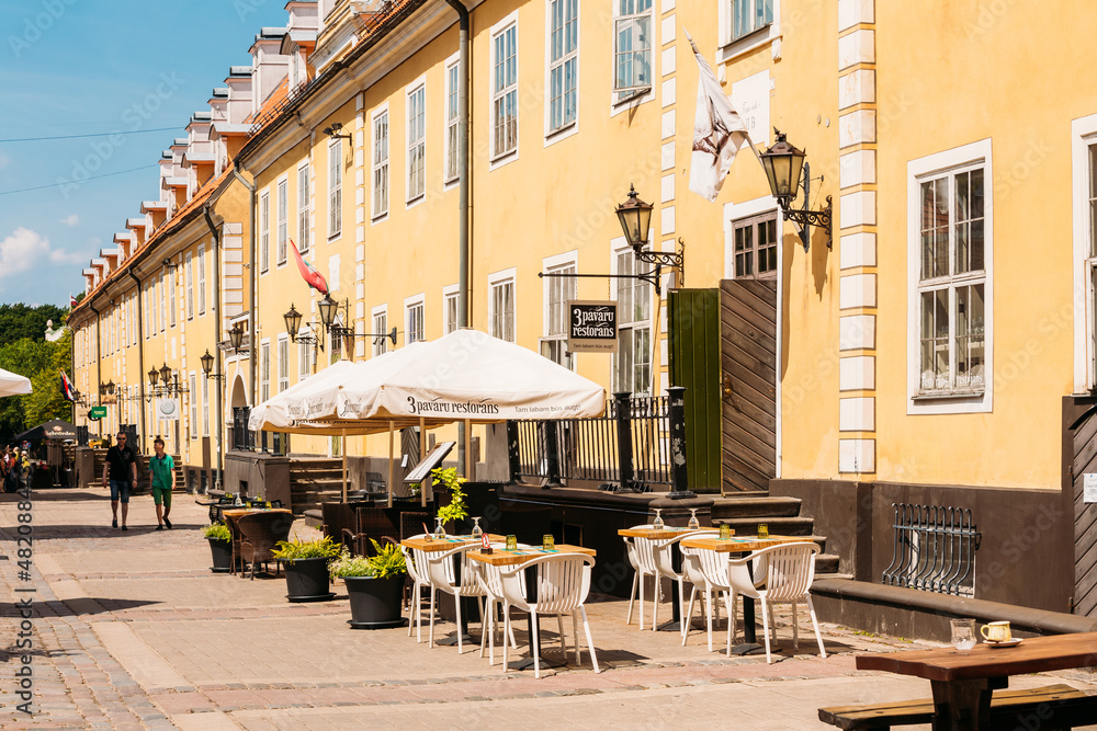 Riga, Latvia - July 2, 2016: Street Cafe Restaurant In Old Town Under ...