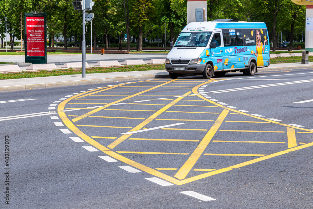 Route transport on a city street with road marking lines Stock Photo ...