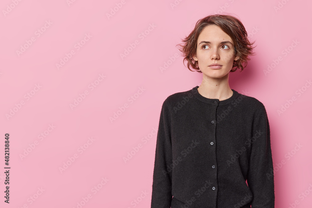 Horizontal shot of young European woman with dark short hair ...