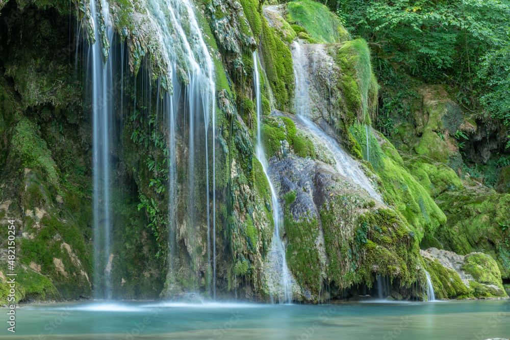 Tuff waterfalls at the source of the Cuisance river near Arbois. Stock ...
