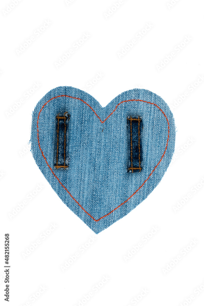 Denim heart with two straps isolated on white background. Ripped denim ...
