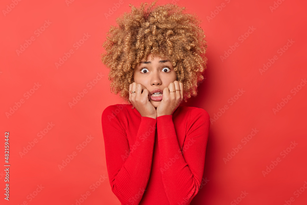 Scared Anxious Woman Keeps Hands Under Chin Looks Worried Afraids Of