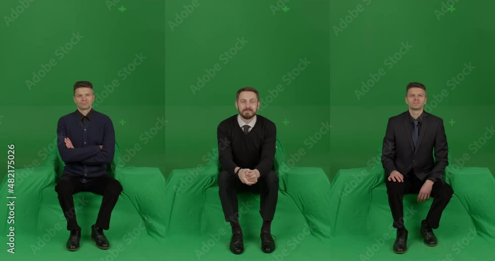 GREEN SCREEN CHROMA KEY Front view of Spectators wearing formal attire ...