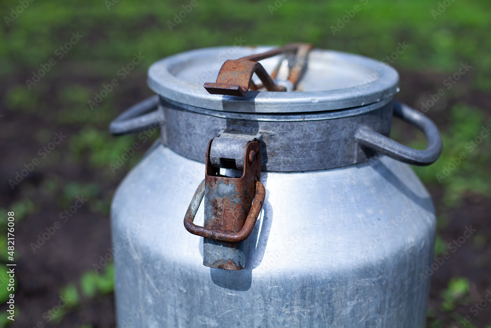 large horizontal photo. summer time. aluminum flask close-up ...