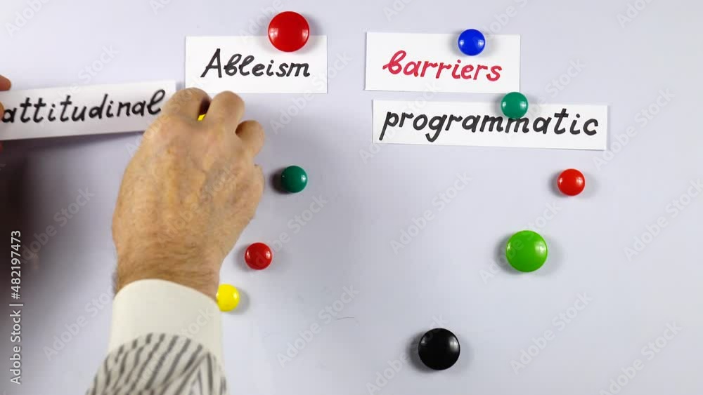 Lecturer giving a presentation about ableism and kinds of barriers for ...