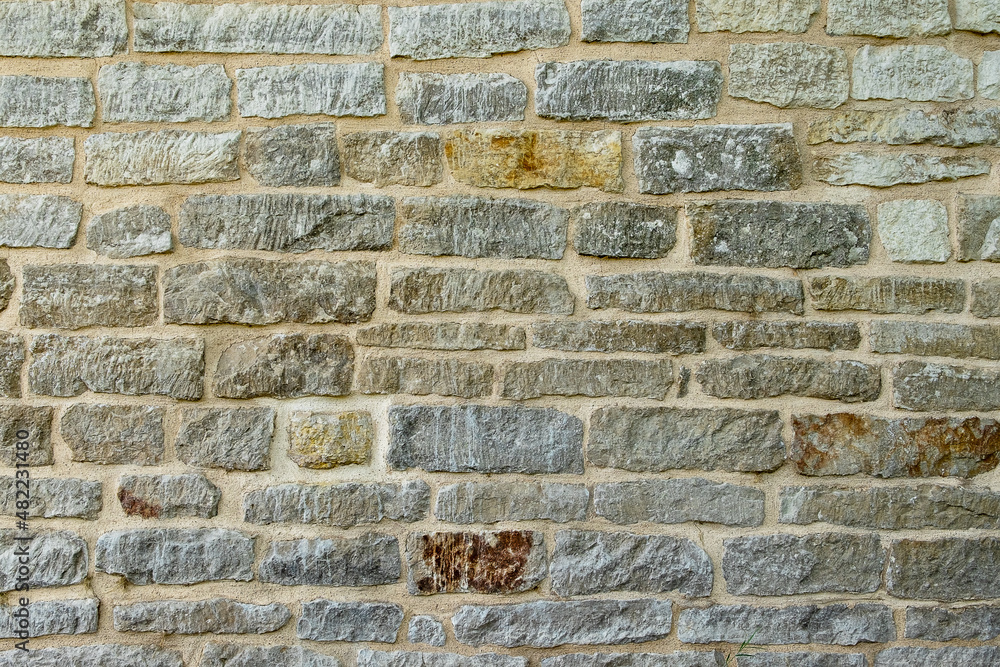 Foto de Fragment of ancient medieval fortress wall made of limestone ...