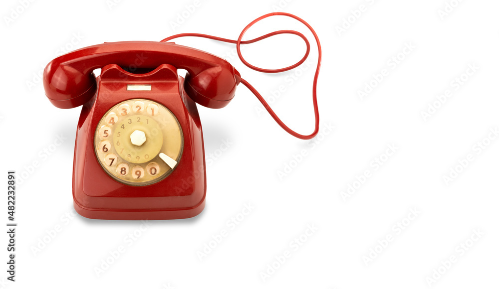 Old red rotating dial telephon isolated on white background in top view ...