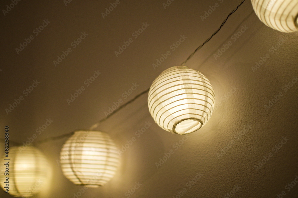 lantern lighting. Atmospheric image in dim lighting. Introduces a ...