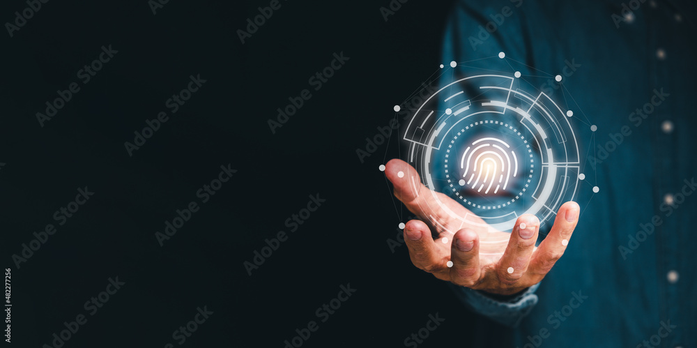 Businessman hand using fingerprint indentification to access personal ...