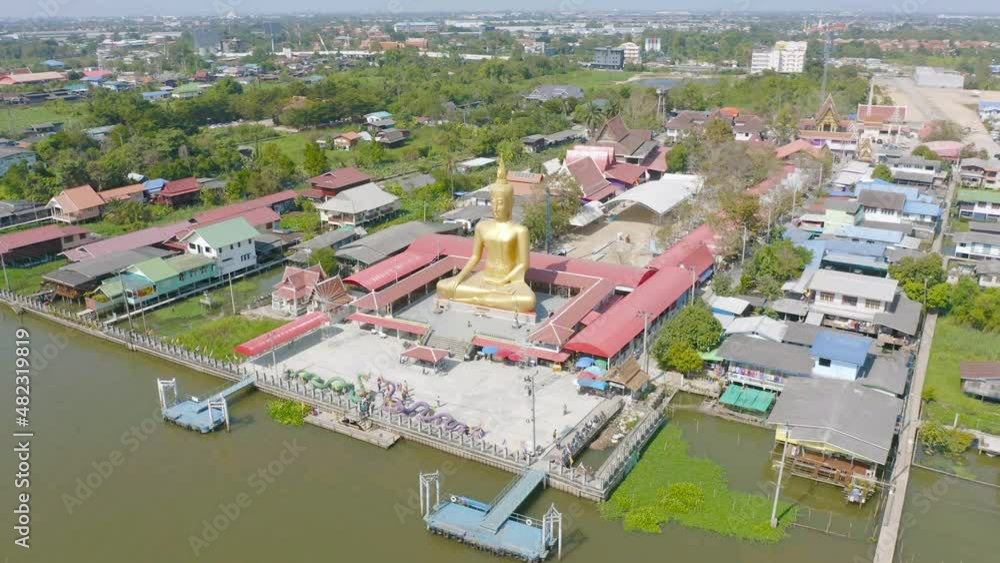 Aerial view of golden buddha pagoda stupa, Nonthaburi, Thailand with ...