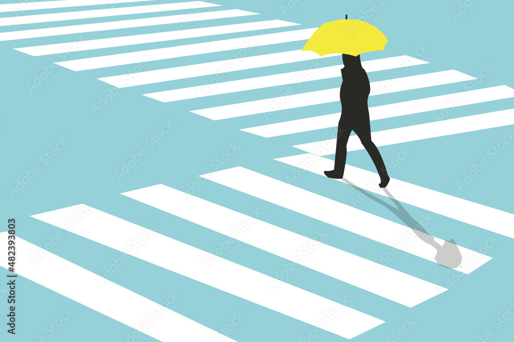 man on pedestrian side walk with yellow umbrella. Concept pedestrians ...