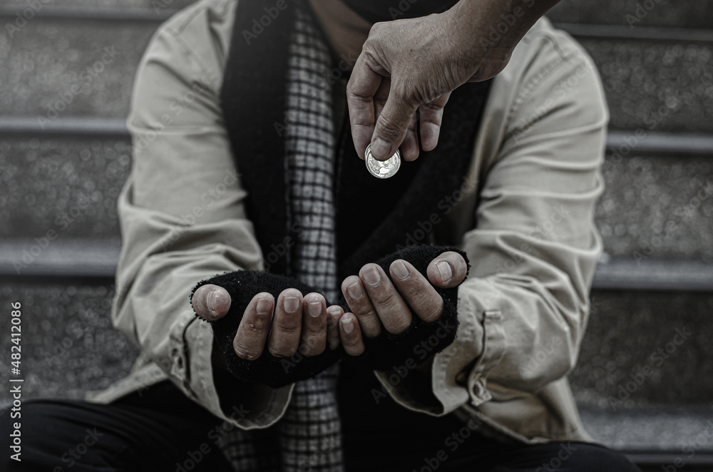 Close-up of the poor or homeless Homeless people ask for money in ...