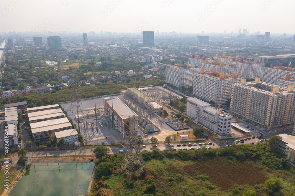Aerial view of electricity generating, voltage poles. Power lines on ...