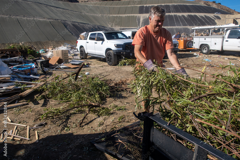 A Sanitary Landfill Site used to Manage Waste looking at a Man ...
