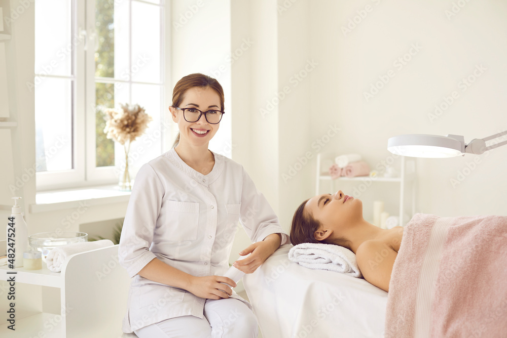 Portrait of happy dermatologist, skin therapist, beautician and ...