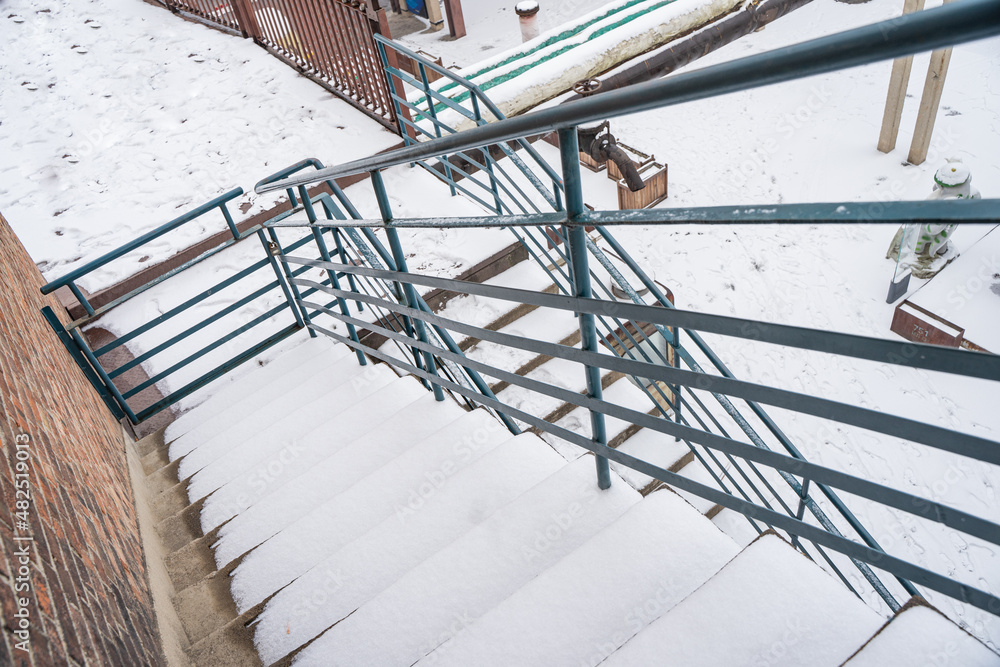 Snow covered old house on stairs in winter Stock Photo | Adobe Stock