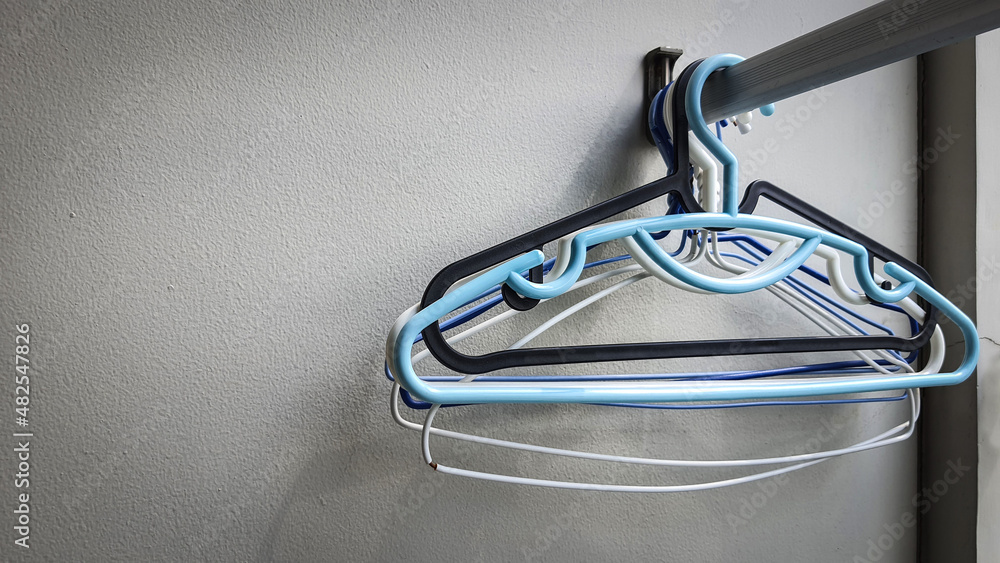 many type of plastic clothes hanger on washing line Stock Photo | Adobe ...