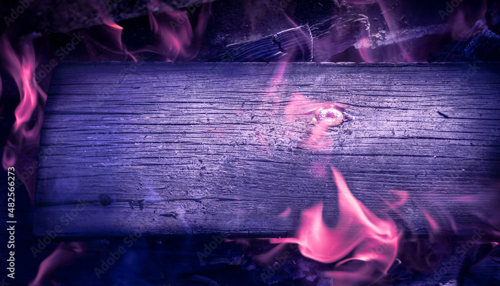 Burning deep violet horizontal board with open purple fire flame ...