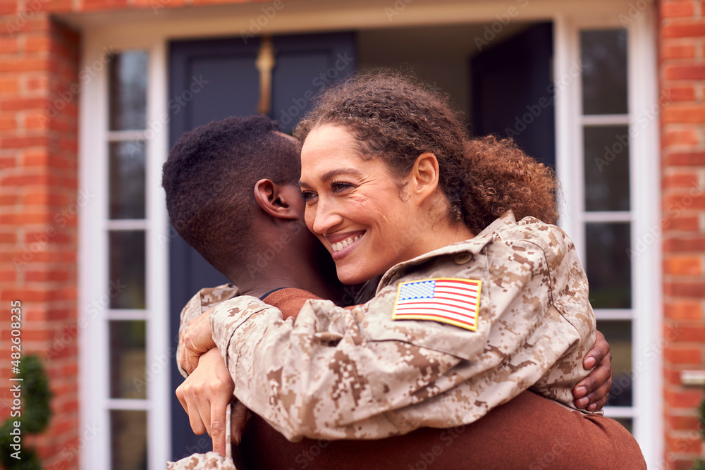 Female American Soldier In Uniform Wearing Returning Home On Leave ...