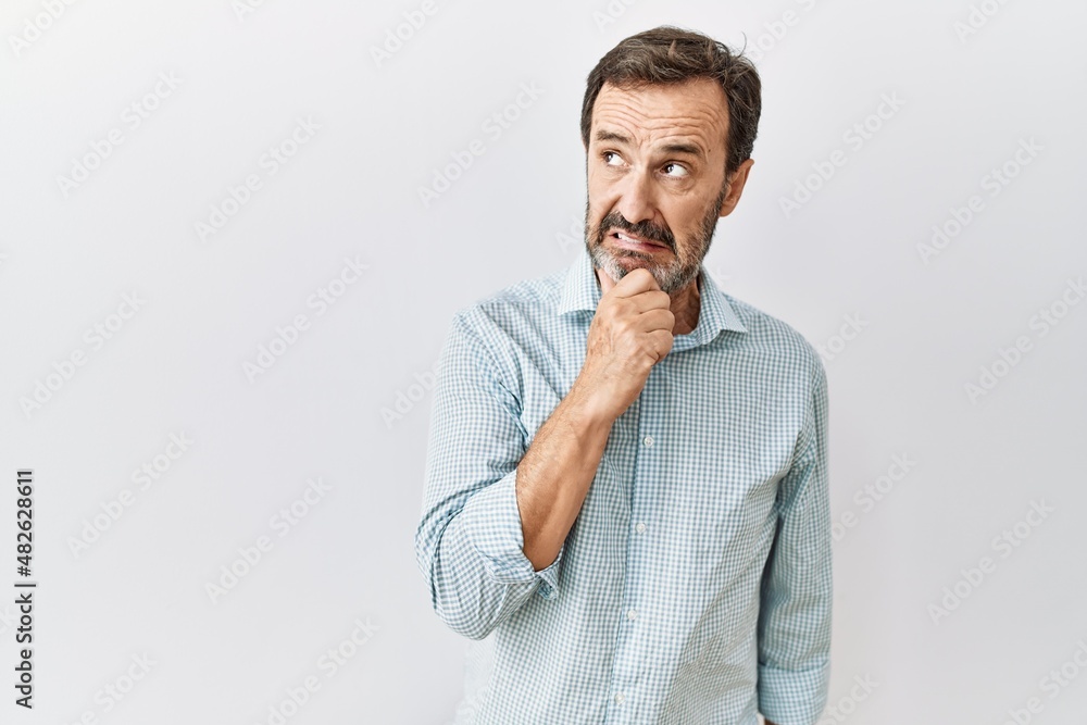 Concerned Hispanic Man