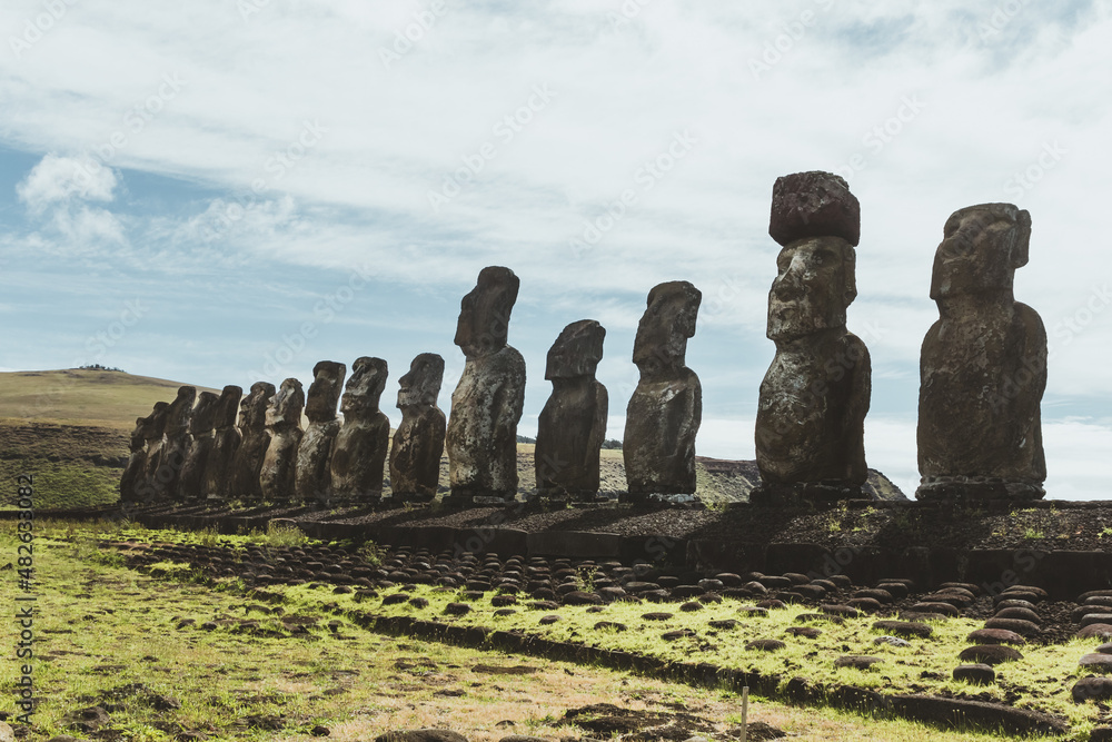 Side view of the fifteen moai of the ahu tongariki on Easter Island ...
