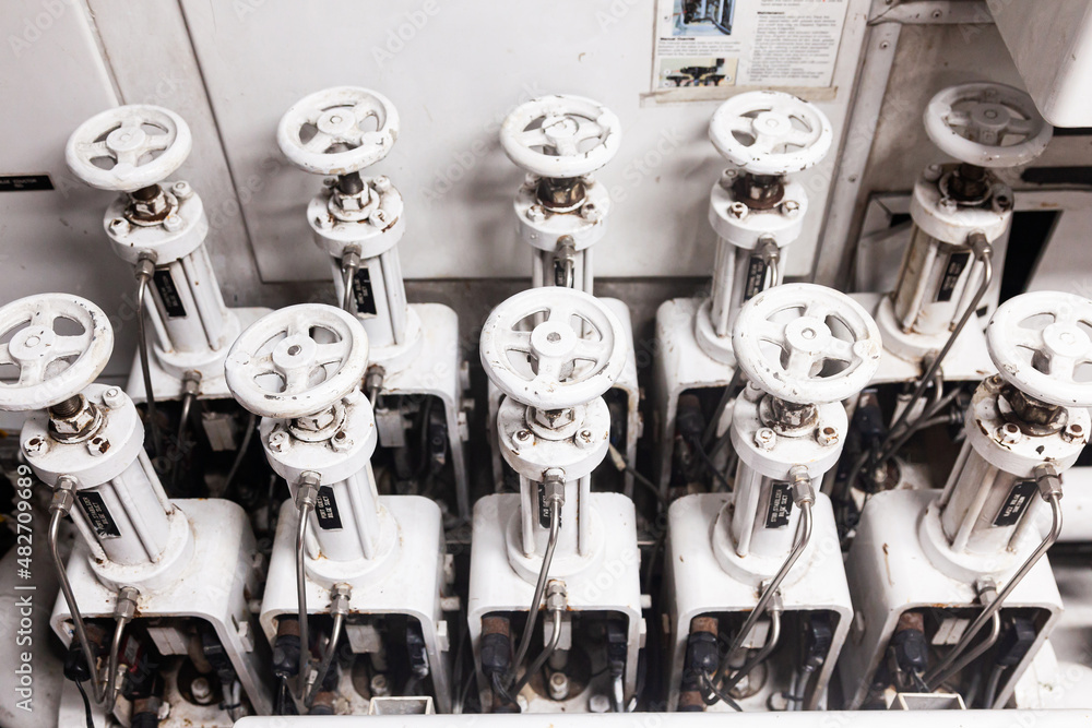 Hydraulic valve system in the ship's engine room. Stock Photo | Adobe Stock
