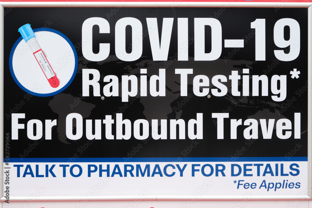 Sign announcing Covid-19 Rapid testing for Outbound Travel Stock Photo ...