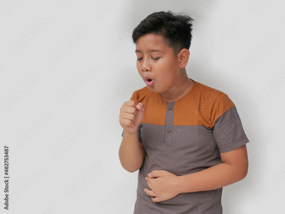 handsome asian boy with cough expression Stock Photo | Adobe Stock