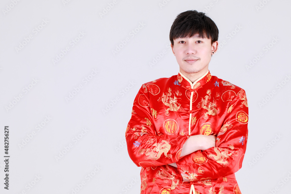 Handsome chinese man on smart red traditional mandarin clothing ...
