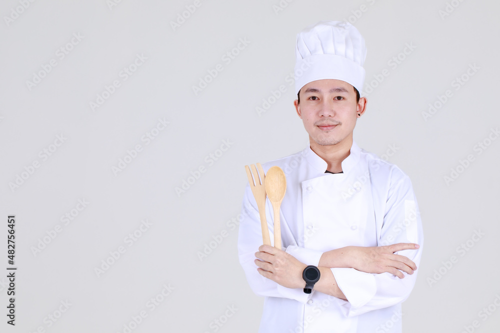 Experienced and smart chinese chef on elegant cooking uniform smile and ...