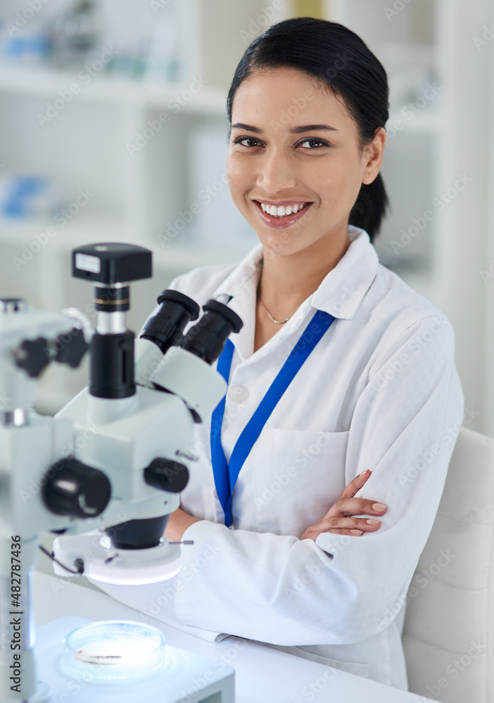 Medical research that makes a difference. Portrait of a young scientist ...